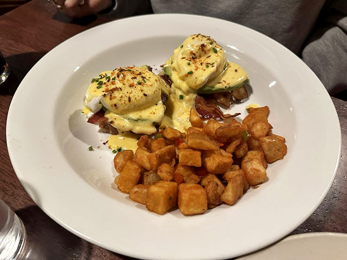 Their Eggs Benedict performs a perfect balancing act &ndash; creamy hollandaise, perfectly poached eggs, and those home fries that deserve their own fan club.