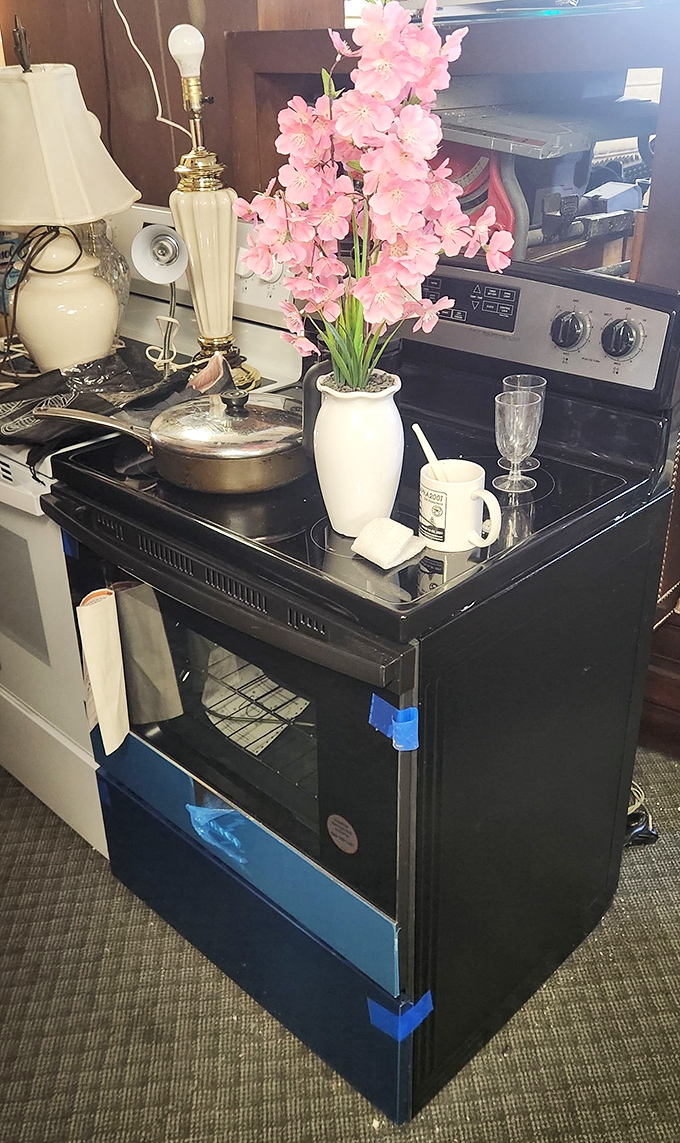 This vintage-style stove topped with pink flowers proves that even appliances deserve a second chance at being both functional and fabulous.
