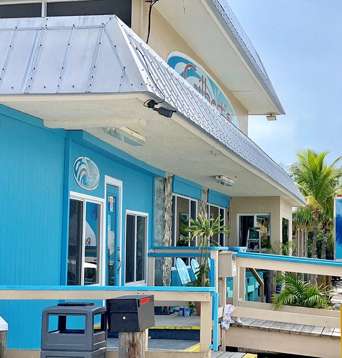 The turquoise exterior isn't just a color choice&mdash;it's a mood statement. Florida's version of "dress for the job you want."