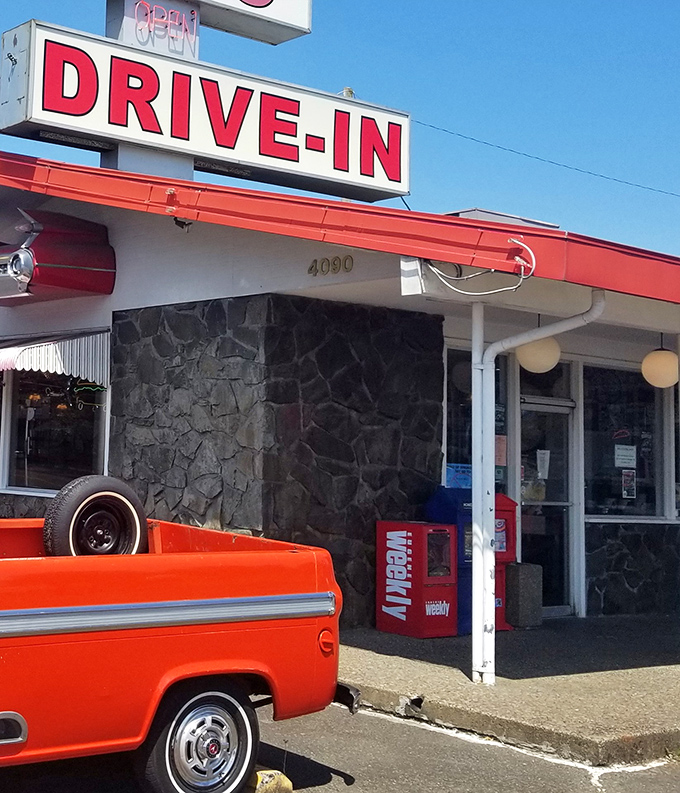 The "DRIVE-IN" sign promises exactly what generations of Americans have loved: straightforward deliciousness without pretension or fuss.