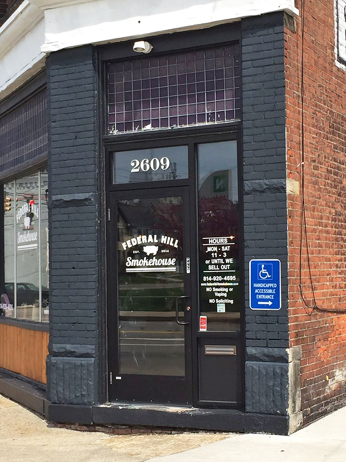 The official entrance &ndash; where hours posted with "or until we sell out" is both a warning and a challenge to arrive early.