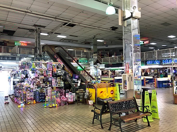 Multi-level shopping madness where treasures await on every floor. The escalator carries you upward to new realms of retail possibility.