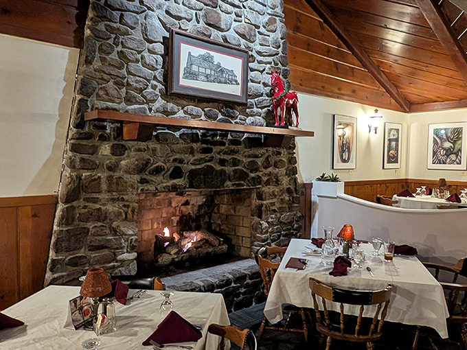 The massive stone fireplace doesn't just warm the room&mdash;it creates that primal connection between fire, food, and fellowship that makes a meal truly memorable.