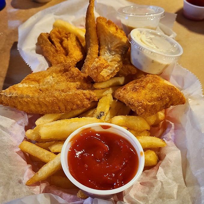 Crispy fish nestled among golden fries&mdash;a classic combo that proves sometimes the simplest pleasures are still the most satisfying.