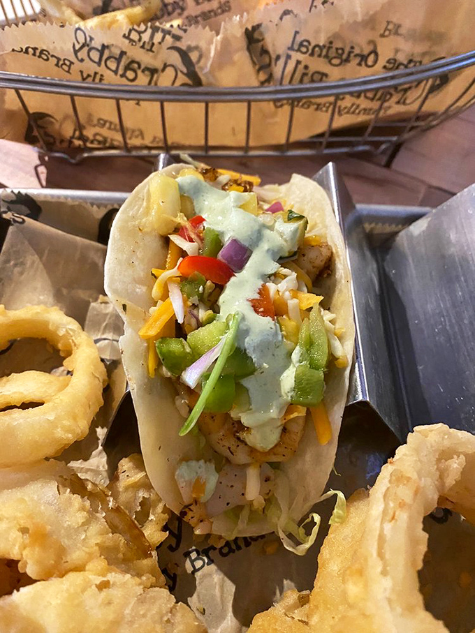 This fish taco isn't just food, it's edible architecture &ndash; layers of flavor stacked so perfectly you almost don't want to dismantle it. Almost.