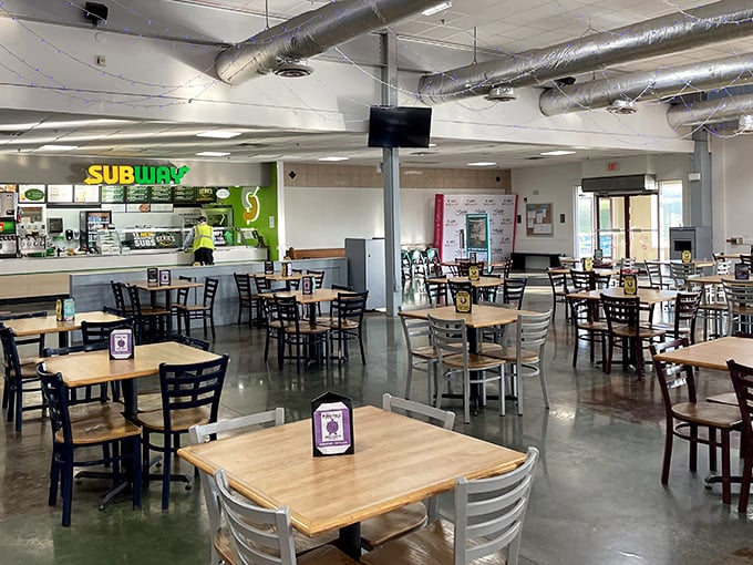 The food court oasis &ndash; where hungry shoppers refuel with submarine sandwiches before diving back into the retail deep end.