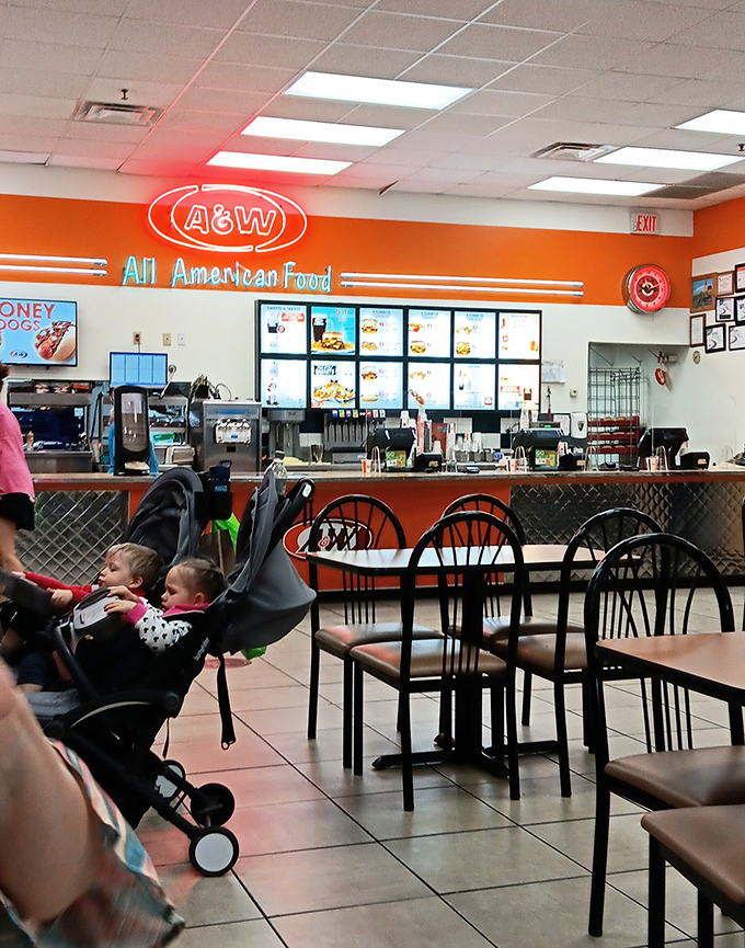 A&W's nostalgic neon glow promises root beer floats and comfort food. The perfect refueling station for shoppers whose blood sugar has dipped to dangerous levels.