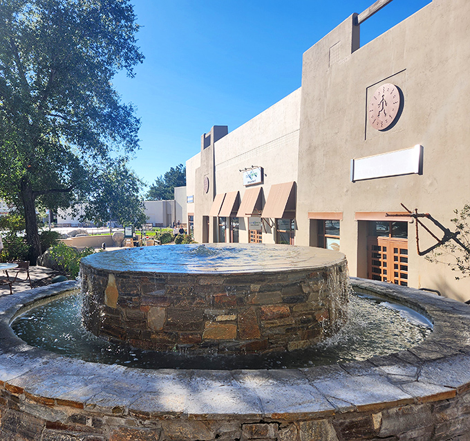 A bubbling stone fountain provides the soothing soundtrack to your shopping adventure. Nature's white noise machine drowning out the sound of credit cards being swiped.