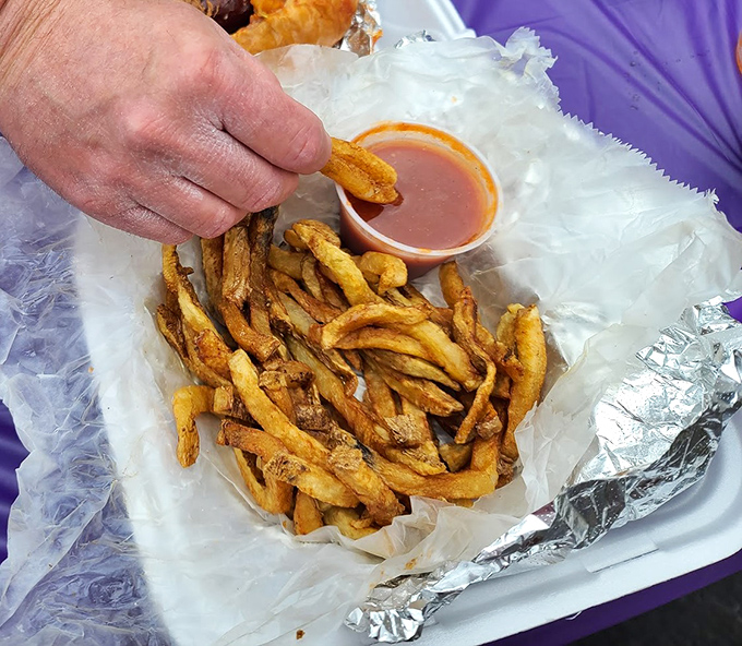 Hand-cut fries with dipping sauce &ndash; simple pleasures that remind you why sometimes the basics, done perfectly, are all you need.