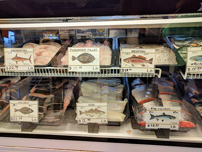 The fresh fish display case—where Tennessee residents can point and say "that one" like they're coastal locals who know their flounder from their redfish.