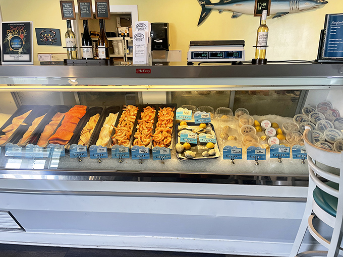 Fresh seafood on ice&mdash;nature's bounty awaiting transformation. This display case isn't just refrigeration&mdash;it's a window into the ocean's generosity.