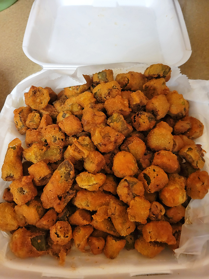 Fried okra: the unsung hero of Southern sides. These golden nuggets offer the perfect crunchy counterpoint to all that tender, smoky meat.
