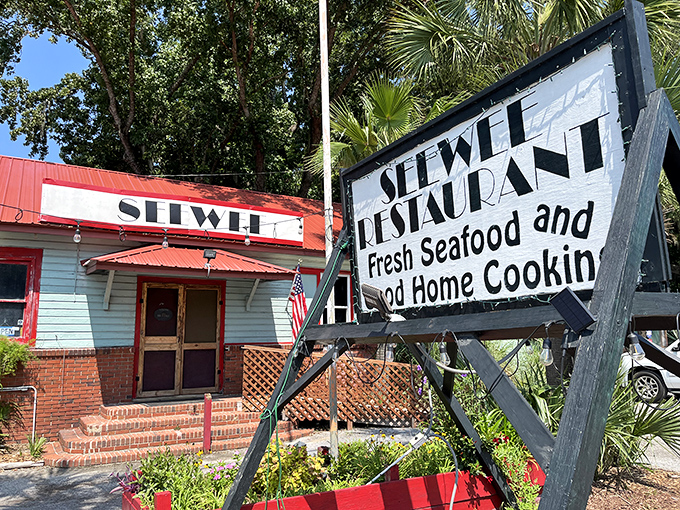 The roadside sign promises "Fresh Seafood and Good Home Cookin'"&mdash;the understatement of the century. This isn't just a restaurant; it's a coastal institution.