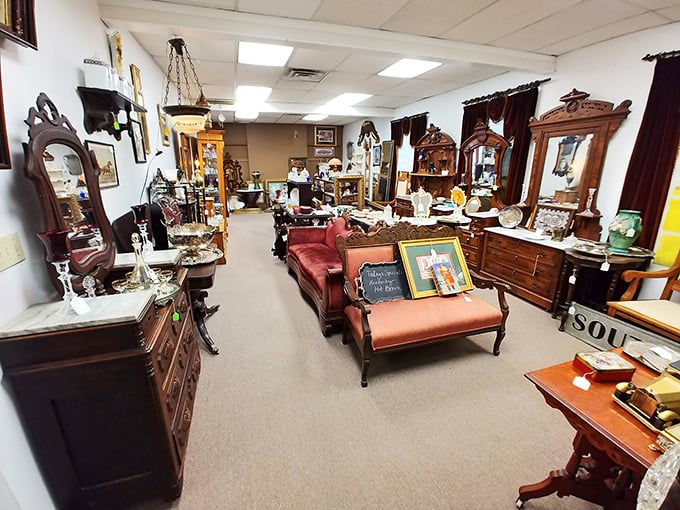 Elegant furnishings arranged like a Victorian parlor waiting for its next soir&eacute;e. That chaise lounge has "dramatic reading spot" written all over it.