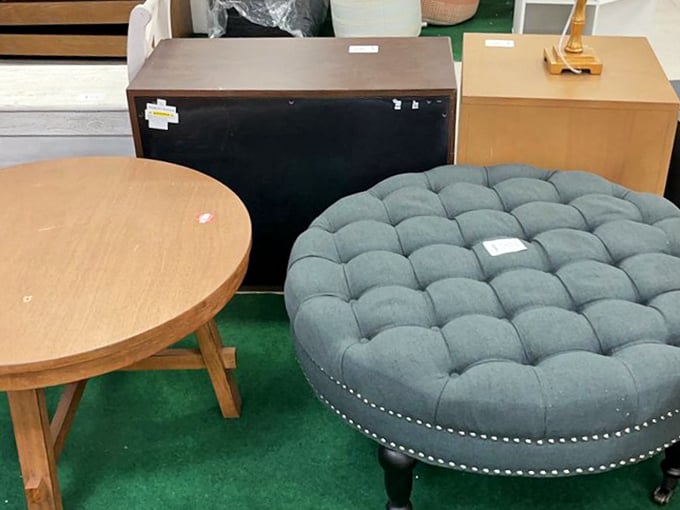 That tufted ottoman paired with simple tables shows style doesn't discriminate based on your bank account balance.