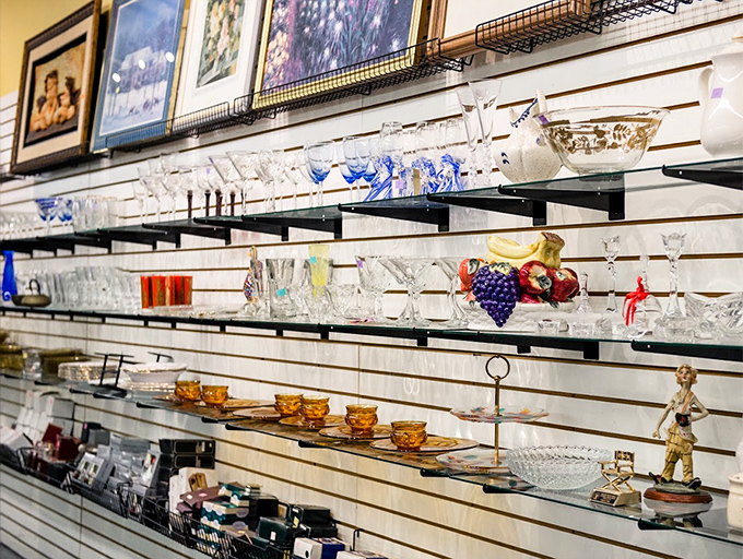 Crystal and glassware that once toasted special occasions sparkle under fluorescent lights. Those blue-swirled champagne flutes are begging to celebrate your next milestone.