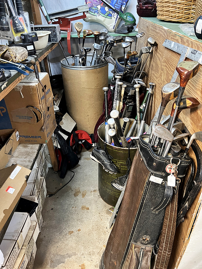 Golf clubs from every era stand at attention. That perfect vintage putter might just contain all the skill your game has been missing.