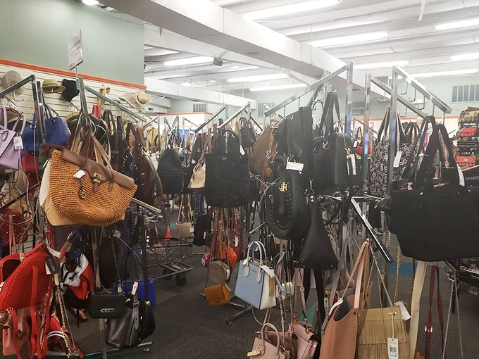 Handbag heaven or purse purgatory? Designer bags hang in suspended animation, waiting for their second chance at accessorizing greatness.