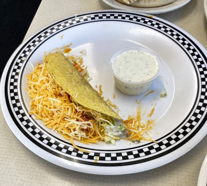 This hard-shell taco with its crown of cheese isn't trying to be authentic&mdash;it's trying to be delicious, and succeeding magnificently.