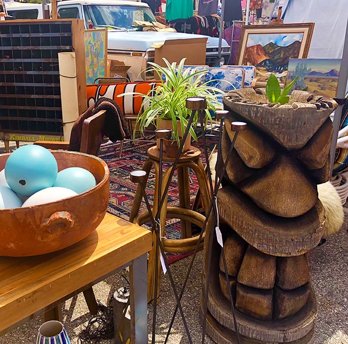 Mid-century meets bohemian in this home d&eacute;cor vignette. That wooden tiki sculpture has stories to tell from someone's 1960s rumpus room.