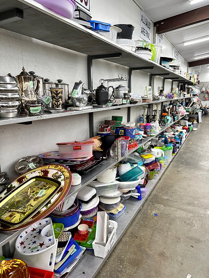 Silver teapots and serving platters wait patiently for their next dinner party, ready to elevate your table from casual to "where did you get that?"