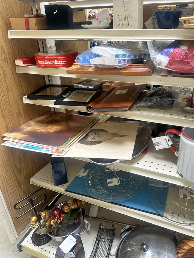 From picture frames to vintage vinyl, these shelves hold the raw materials for countless Pinterest projects and nostalgic collections.