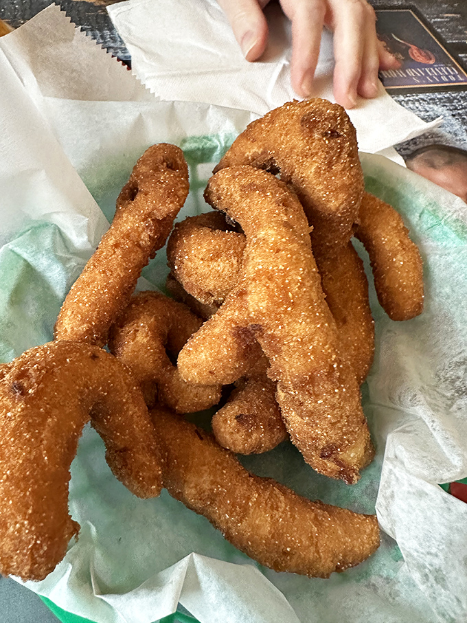 Hush puppies so perfectly golden and crisp, they make you wonder why anyone would ever waste stomach space on bread.