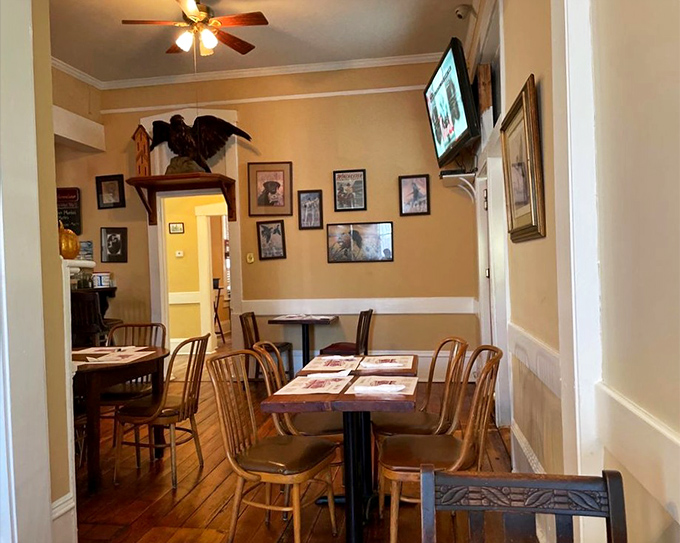Warm yellow walls and wooden chairs create the kind of unpretentious dining space where memories are made between bites of legendary Southern fare.
