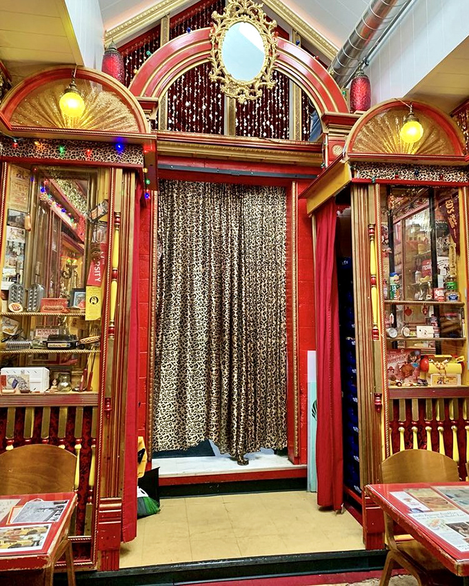 Leopard print curtains and ornate gold archways&mdash;because even hot dogs deserve a theatrical entrance before their grand performance on your taste buds.