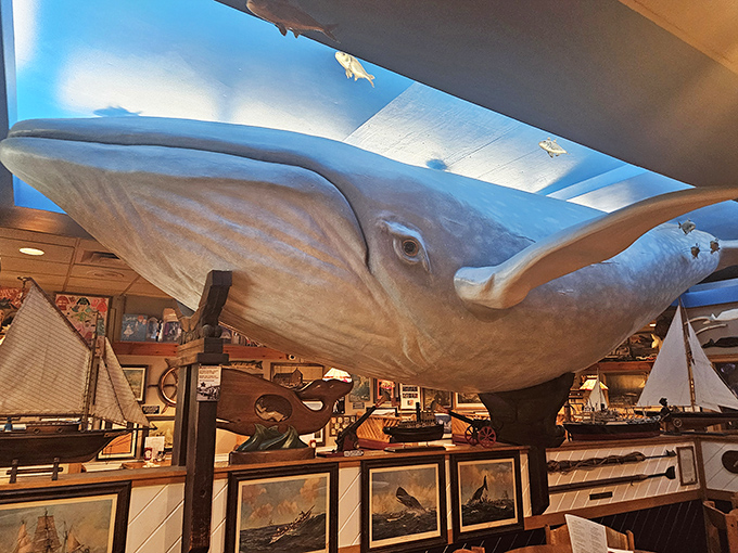 A massive whale sculpture watches over diners, as if to remind you where your dinner once swam.
