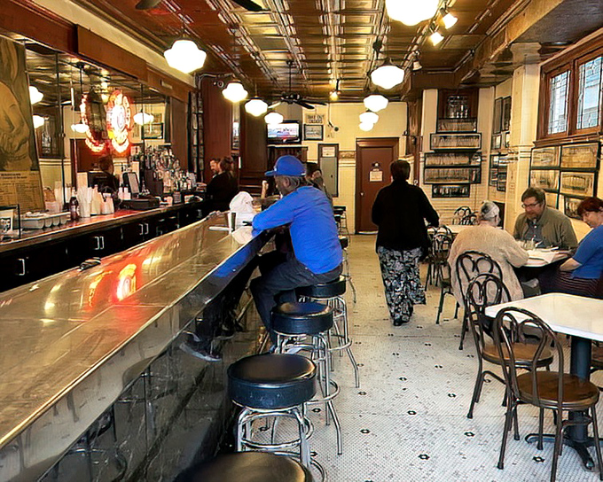The dining room hums with conversation and satisfaction. These tables have hosted first dates, business deals, and family celebrations since your grandparents' time.
