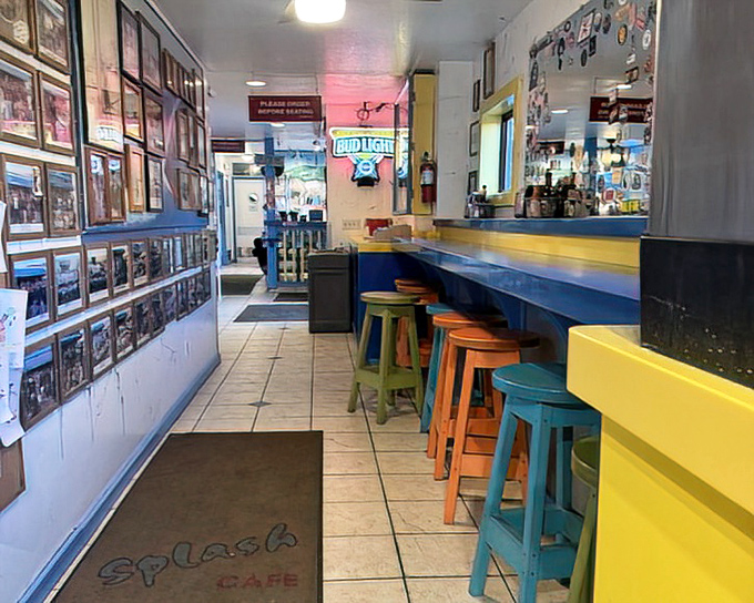 The colorful stools and photo-lined walls tell stories of countless happy meals&mdash;a community built one bread bowl at a time.