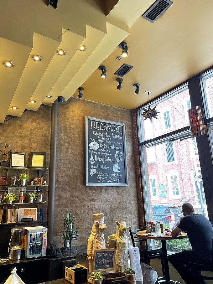 Modern meets historic in Redsmoke's thoughtfully designed interior, where warm lighting and textured walls create the perfect backdrop for serious eating.