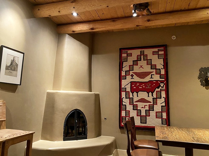 That kiva fireplace and Southwestern textile aren't just decoration&mdash;they're a warm embrace from New Mexico itself, saying "stay awhile, friend."