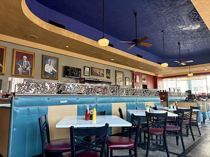 The blue ceiling and retro booths create a dining atmosphere that's both nostalgic and timeless, like finding your grandmother's recipe box filled with secrets to happiness.