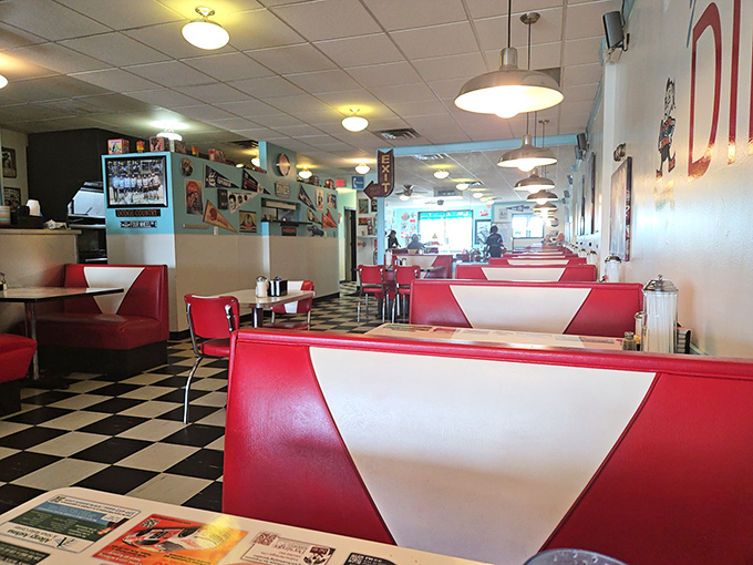 Red and white booths invite you to slide in and stay awhile in this temple of comfort food and conversation.