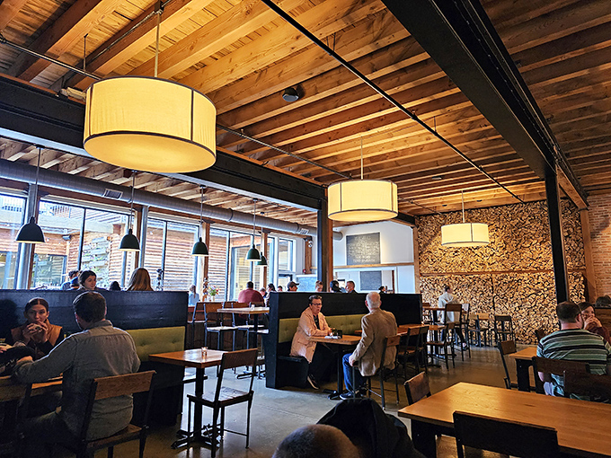 Warm wooden tones and drum lighting create an ambiance that says "stay awhile" without saying a word.