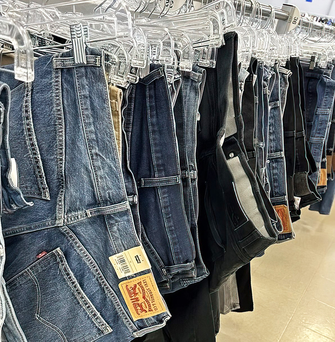 Levi's jeans hanging like denim soldiers, ready to march into your wardrobe at a fraction of retail cost.
