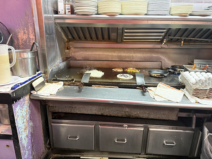 Where the magic happens&mdash;a well-seasoned flat top that holds decades of delicious secrets. No fancy equipment needed.