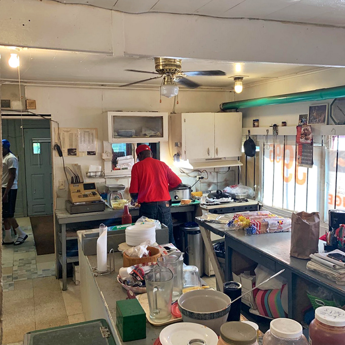 Behind the scenes in the kitchen, where barbecue magic happens without fanfare or fuss &ndash; just dedication to a craft perfected over decades.