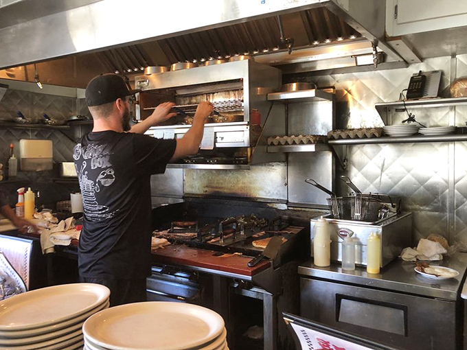 Behind the scenes where breakfast magic happens. No smoke and mirrors, just skilled hands and a well-seasoned grill.