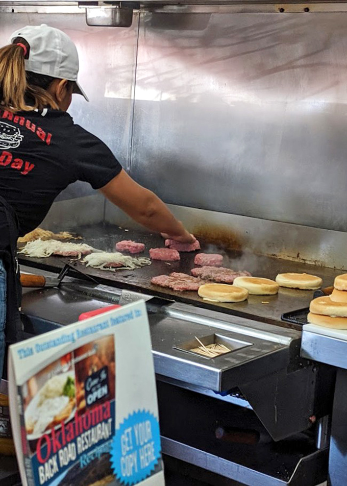 Burger alchemy happens here&mdash;where skilled hands press onions into patties on a seasoned grill that's seen more action than an action movie.