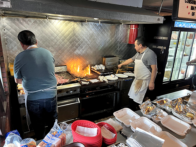 The open kitchen lets you watch the magic happen on those flame-kissed grills of glory.