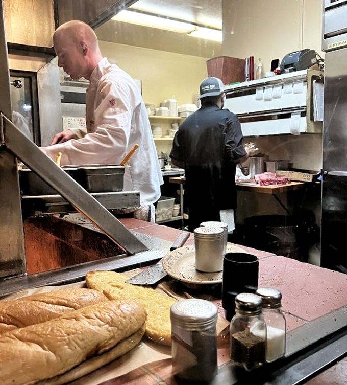 A glimpse into the kitchen reveals the behind-the-scenes magic, where simple ingredients transform into extraordinary meals through skill and tradition.