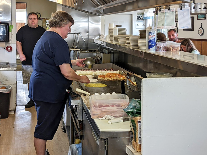Behind the scenes, where breakfast dreams come true and spatulas move with the confidence of tools that have flipped thousands of perfect eggs.
