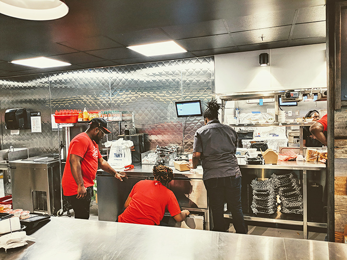 Behind the scenes where the magic happens&mdash;a choreographed dance of frying, spicing, and creating memories one piece of chicken at a time.