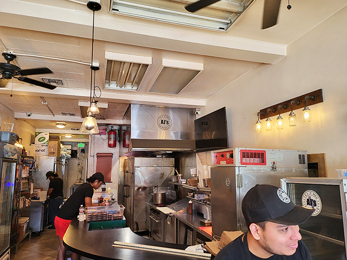 Stainless steel, focused staff, and the gentle hum of smokers working overtime. This is where patience becomes flavor.