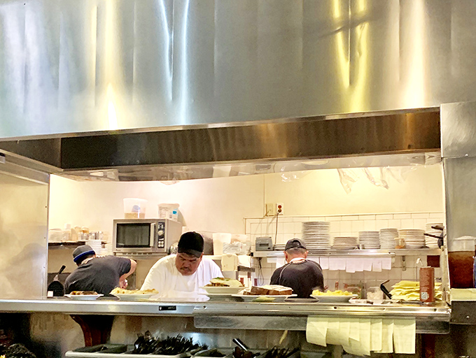 Behind the scenes, the kitchen crew works with the precision of NASA engineers, except their mission is sending pancakes to the moon.