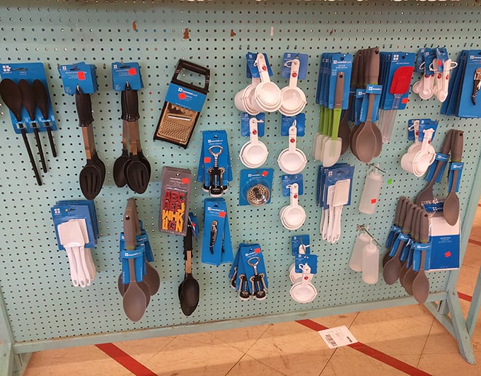 Kitchen utensils displayed with military precision &ndash; because even your spatula collection deserves organization and respect.