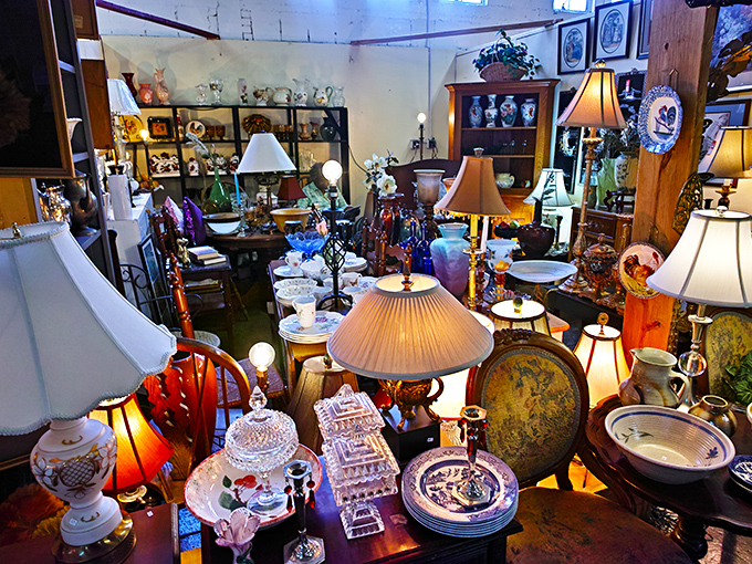 Lamp lady paradise or the set of a Wes Anderson film? This booth's organized chaos of lighting fixtures creates a warm, glowing invitation.